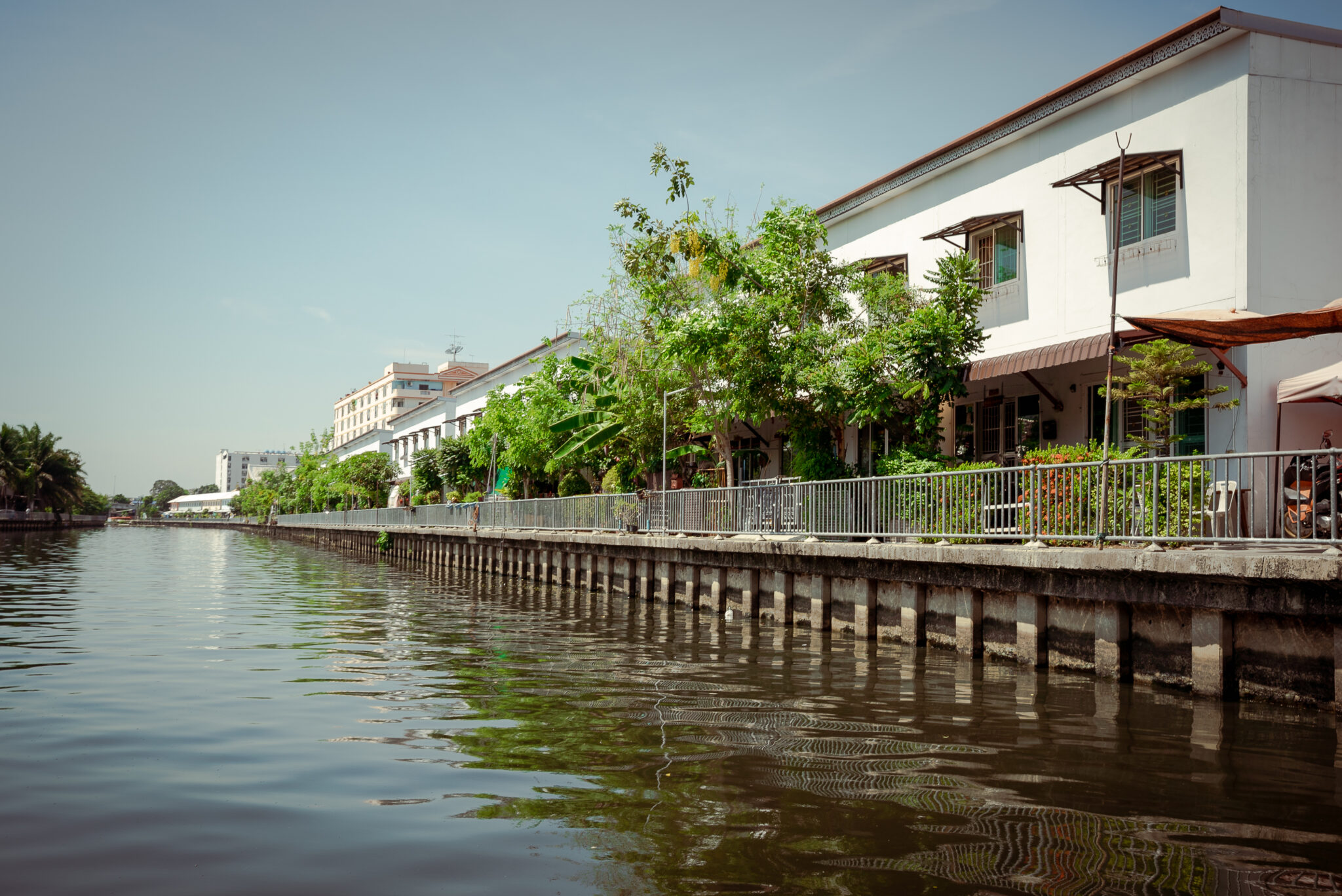 Bangkok's canal housing settlements tackle flooding but rouse mixed reactions